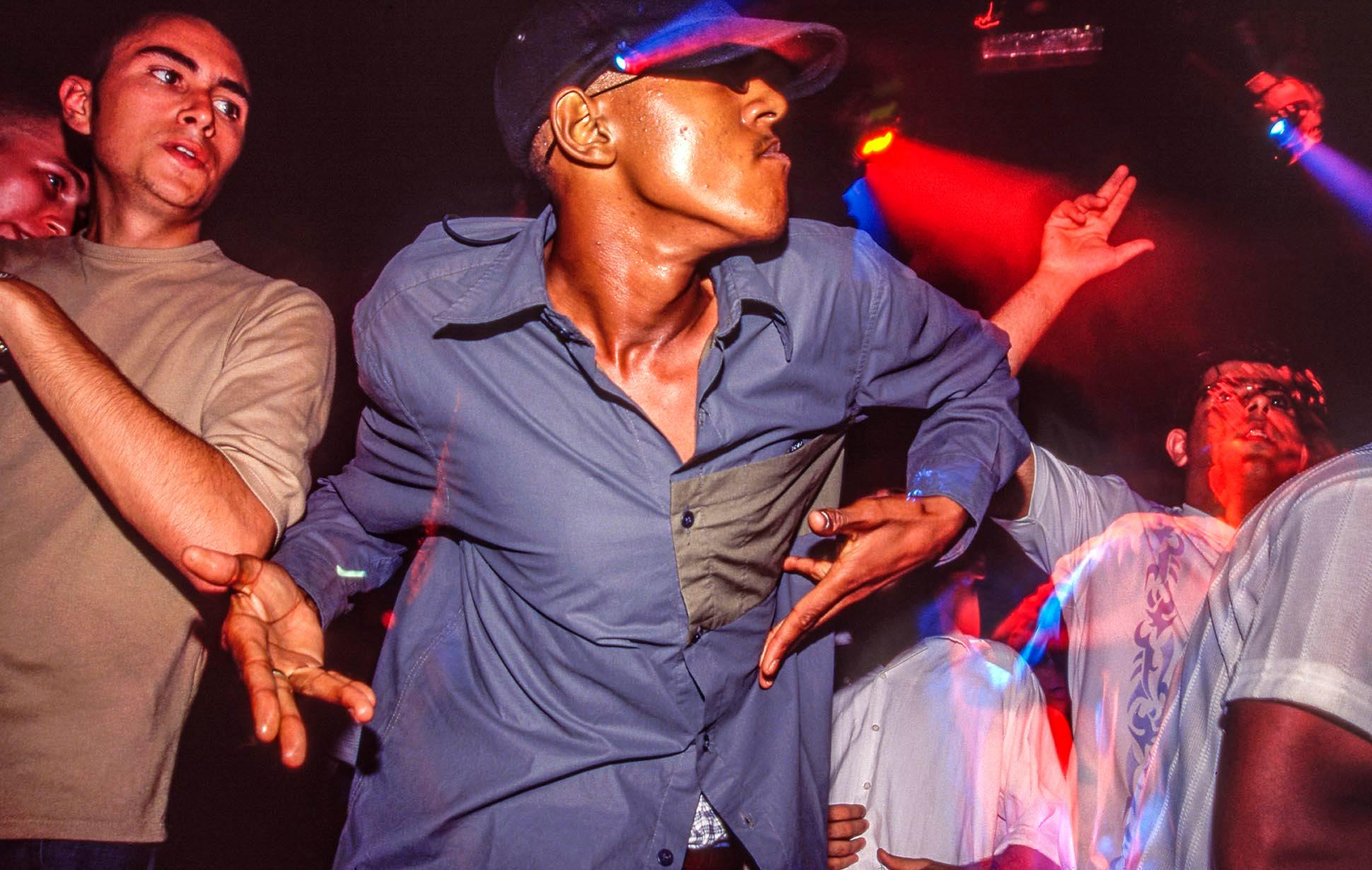 Early 2000s nightlife in all its chaotic, shiny glory